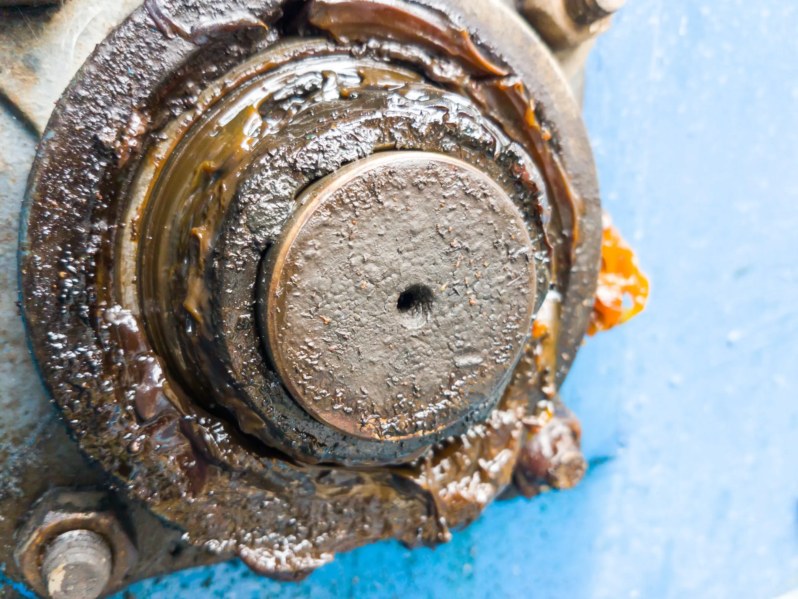 How to Identify & Fix Over-Lubrication Issues in Equipment - DropsA